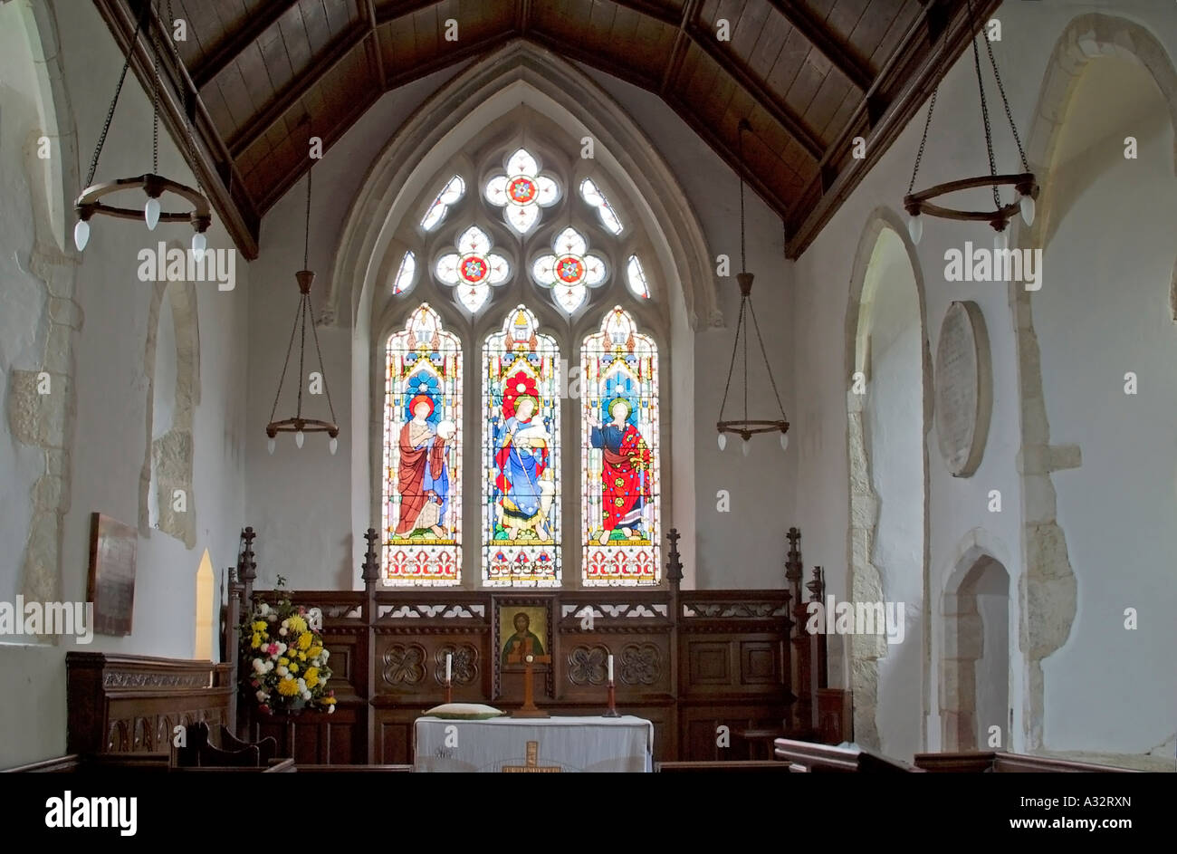 Main stained glass window above altar at St Marys Church Sullington ...