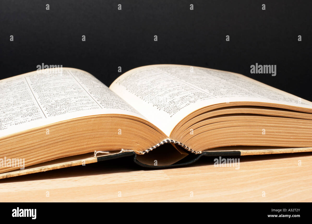 Open book with text Stock Photo - Alamy