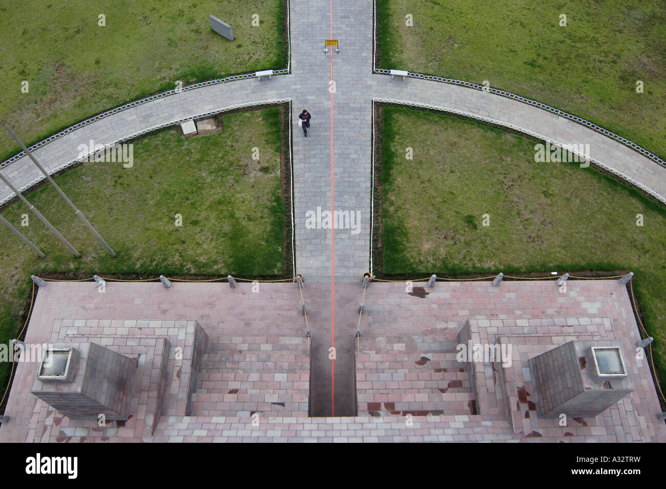 Symbolic Equator line on the foot of the monument Mitad del Mundo (the ...