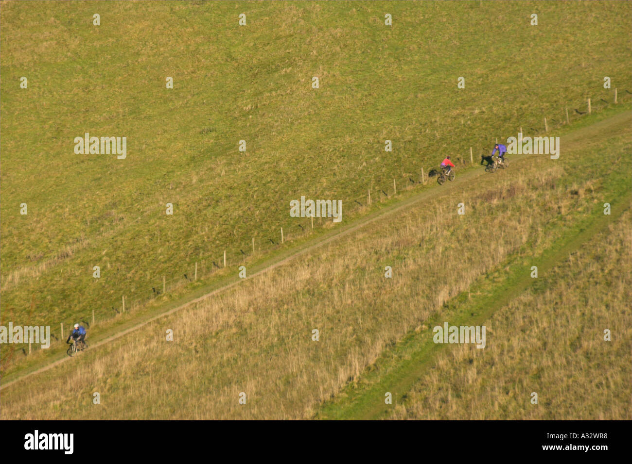 Cyclists on a downland pathway in Southern England Stock Photo - Alamy