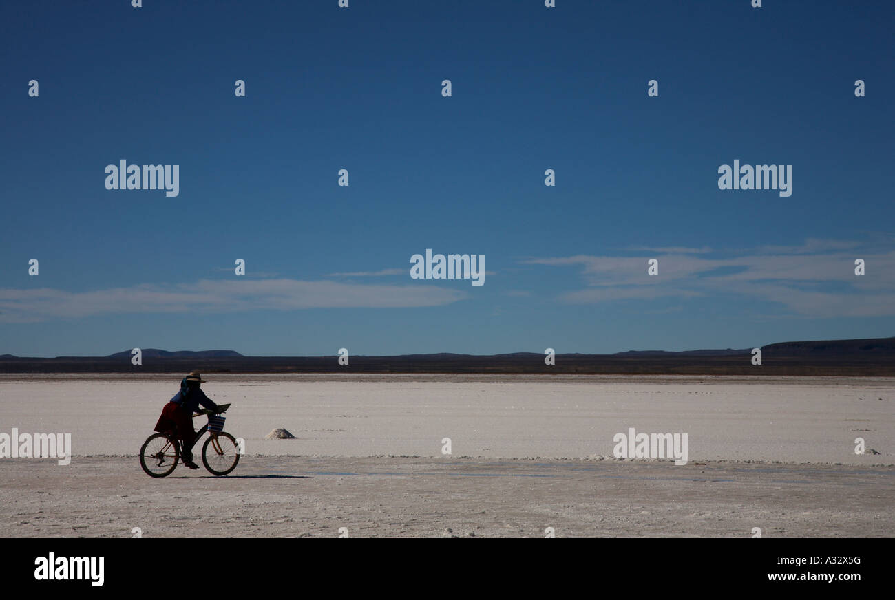 women on bike salt flats uyuni Stock Photo - Alamy