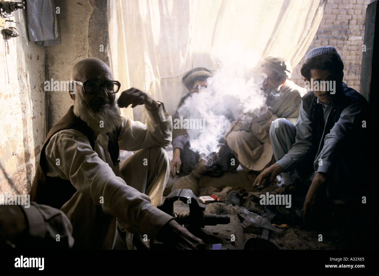 Men smoking cannabis, Dara, North West Frontier Provence, Pakistan ...