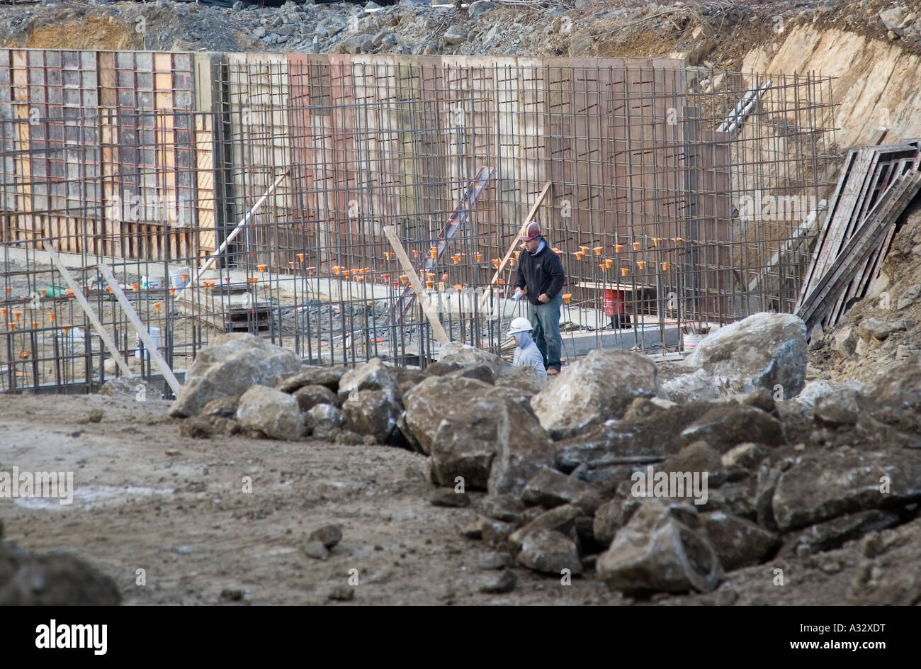Construction workers at a job site Stock Photo - Alamy