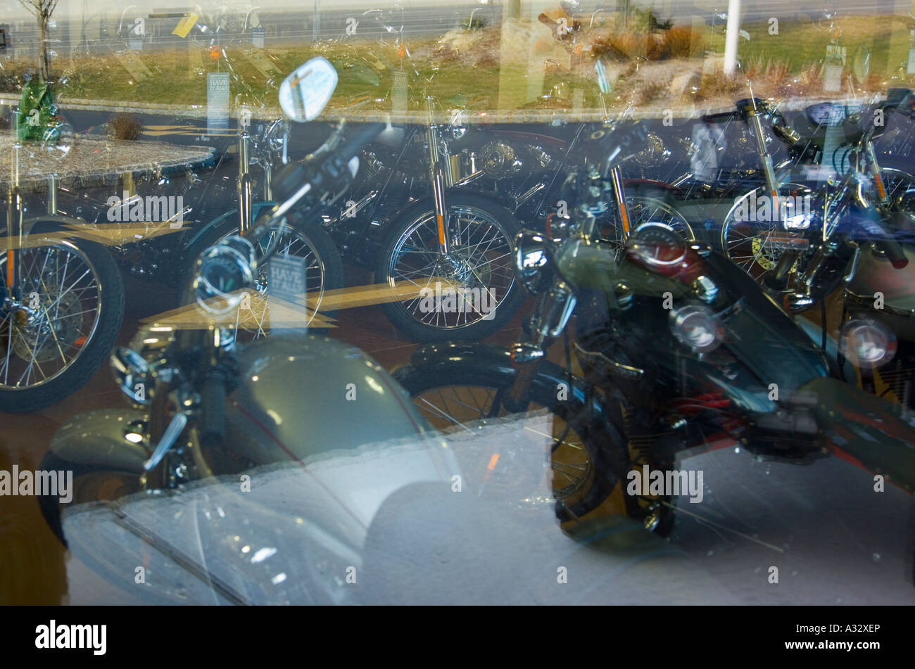 Motorcycles in a showroom window Stock Photo - Alamy