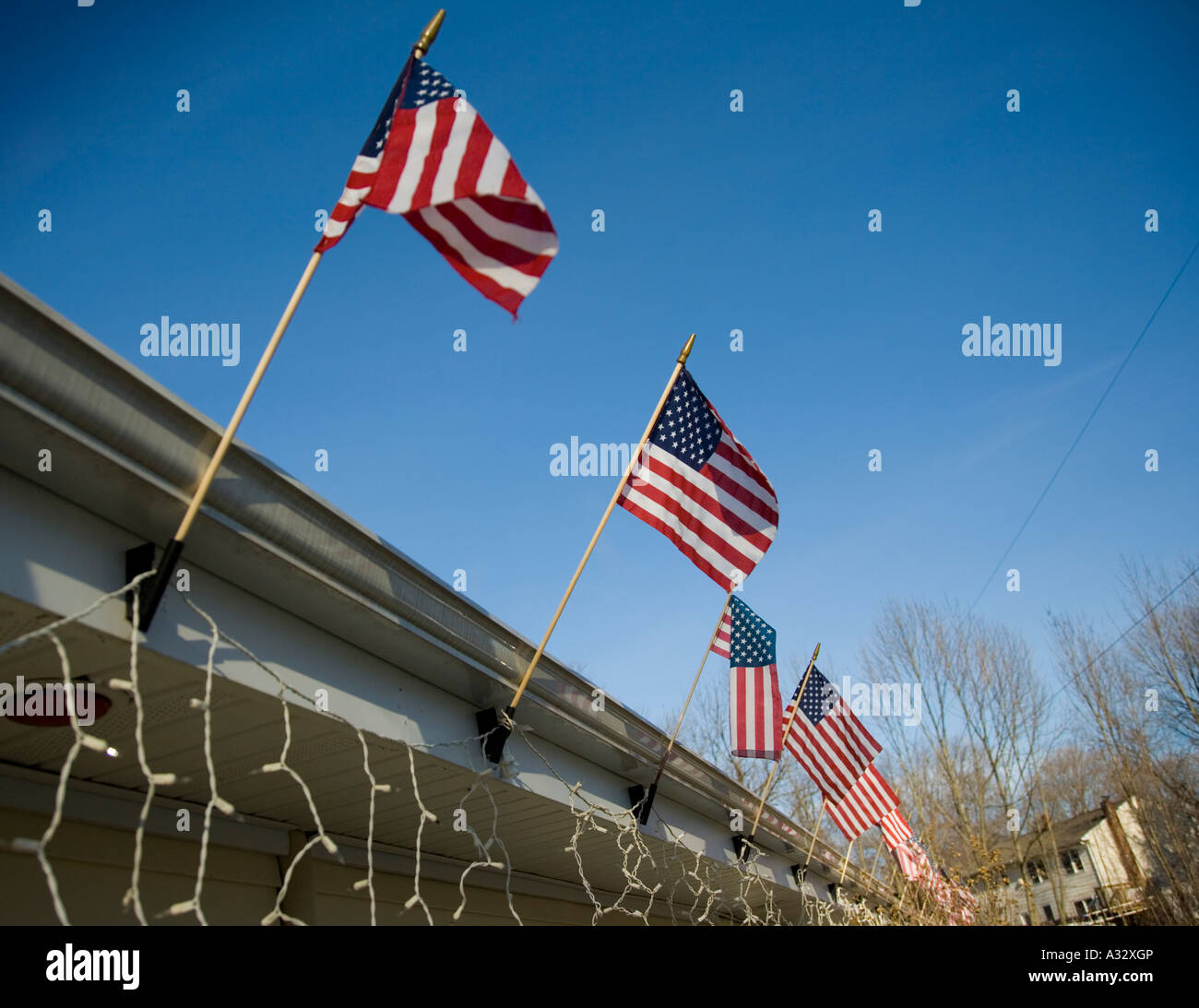American flags on a building Stock Photo - Alamy