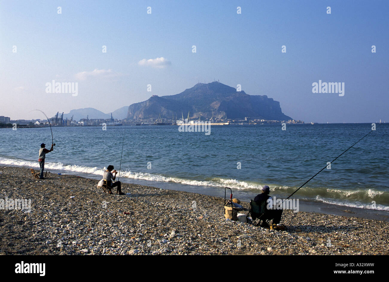 Anglers sea fishing from a beach near Palermo, Sicily, Italy Stock ...