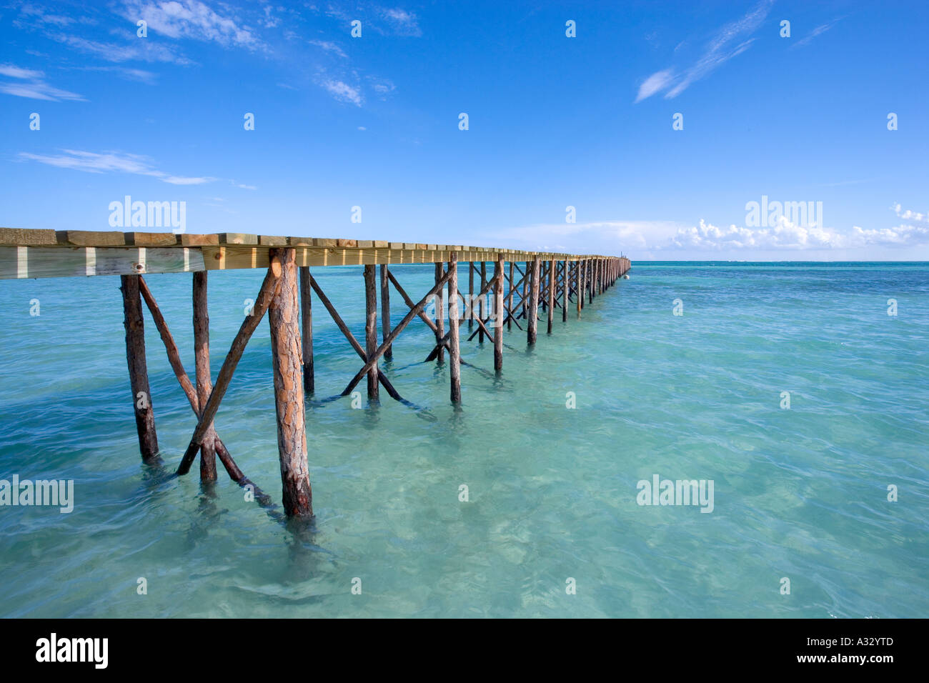 Bahamas, Abaco. Long public dock stretching out into the ocean Stock ...