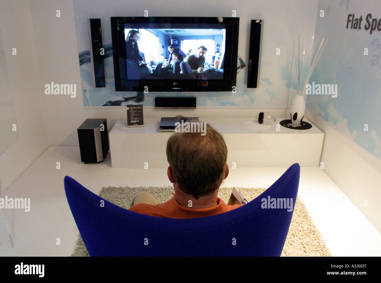 Man sitting in front of his tv set hi-res stock photography and images ...