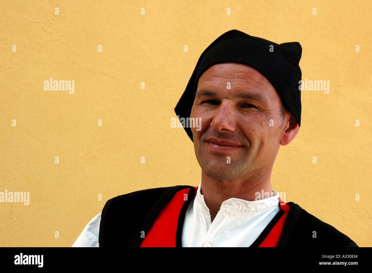 Man wearing a traditional Sardinian costume Stock Photo - Alamy