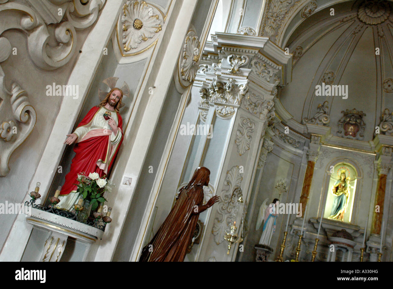 A detail of the inside of the Rococo Church of San Giuseppe in Taormina ...