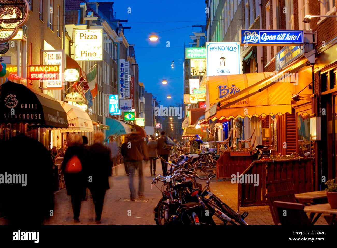 Evening street scene in Amsterdam, Netherlands, Holland, Europe Stock ...