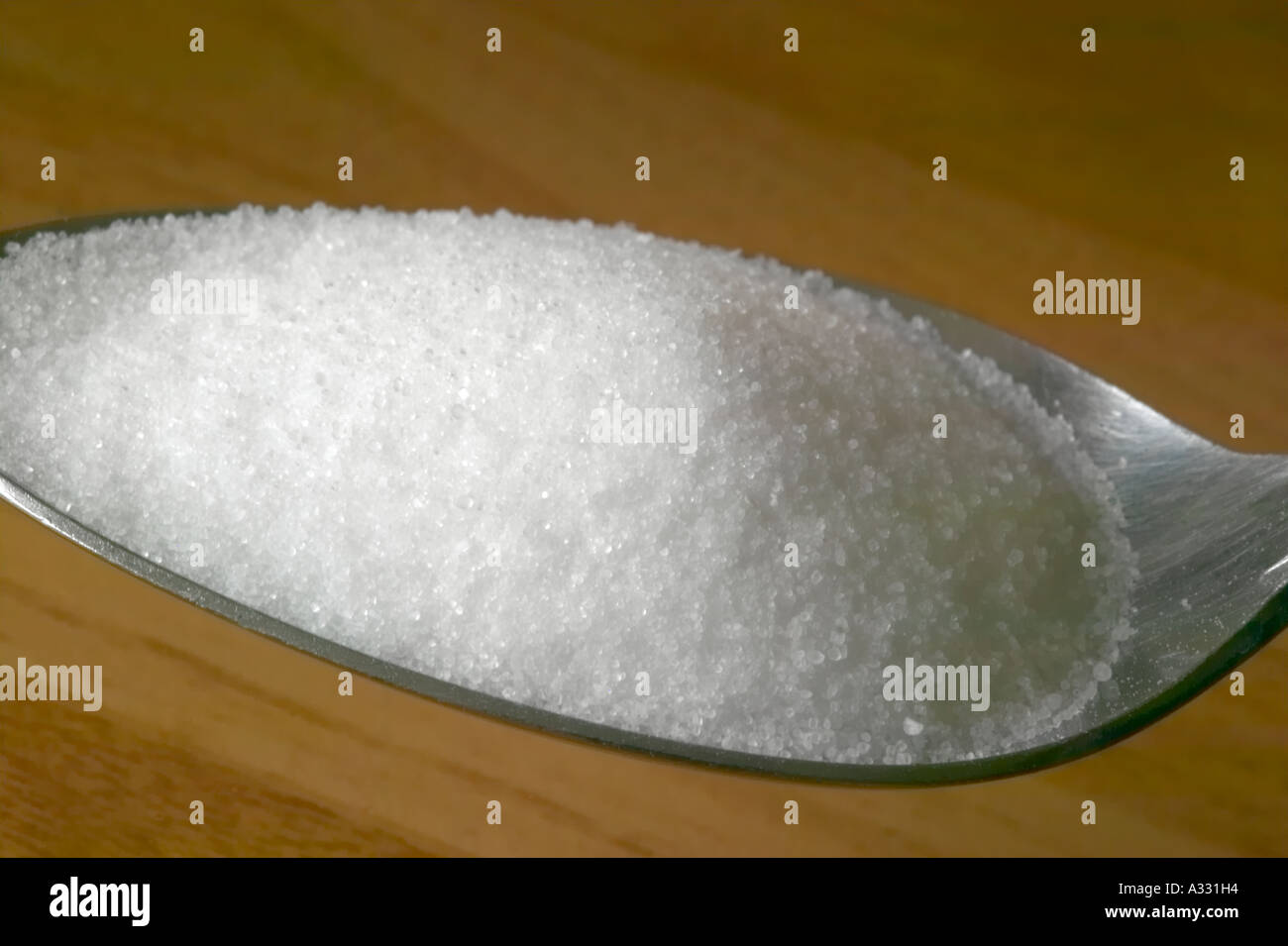 refined salt on spoon Stock Photo - Alamy