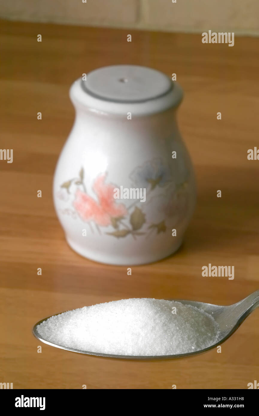 refined salt in shaker and on spoon Stock Photo - Alamy