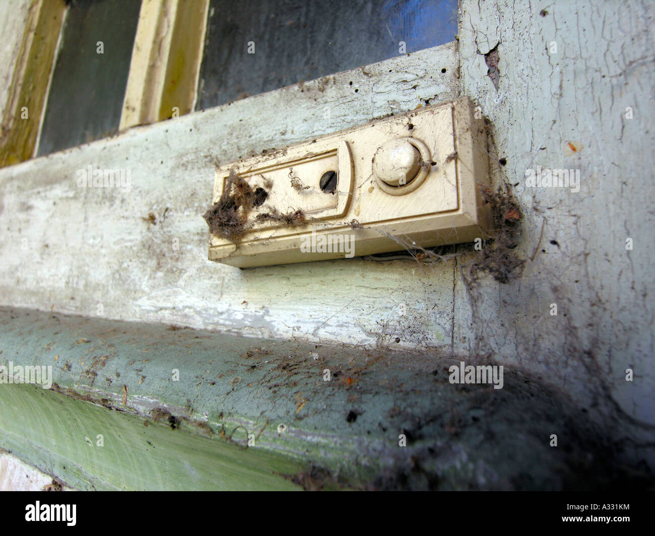 old broken down bell at a door Stock Photo - Alamy