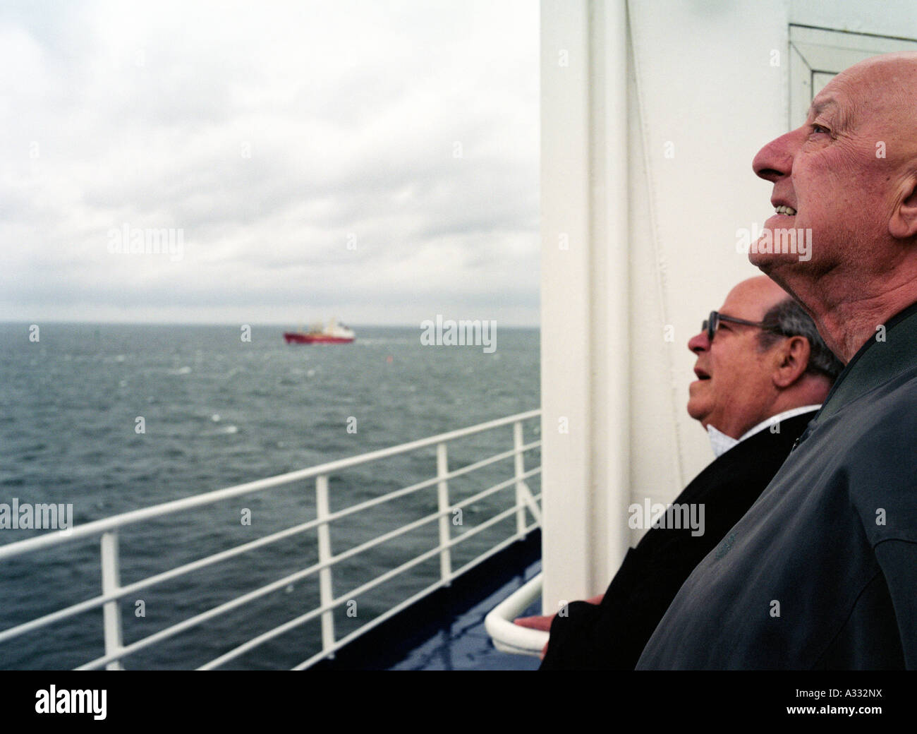 Two elderly men on a ferry ship of the Reederei Color Line Stock Photo ...