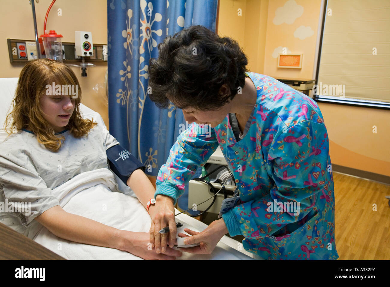 Teenage Girl Prepares for Surgery Stock Photo - Alamy