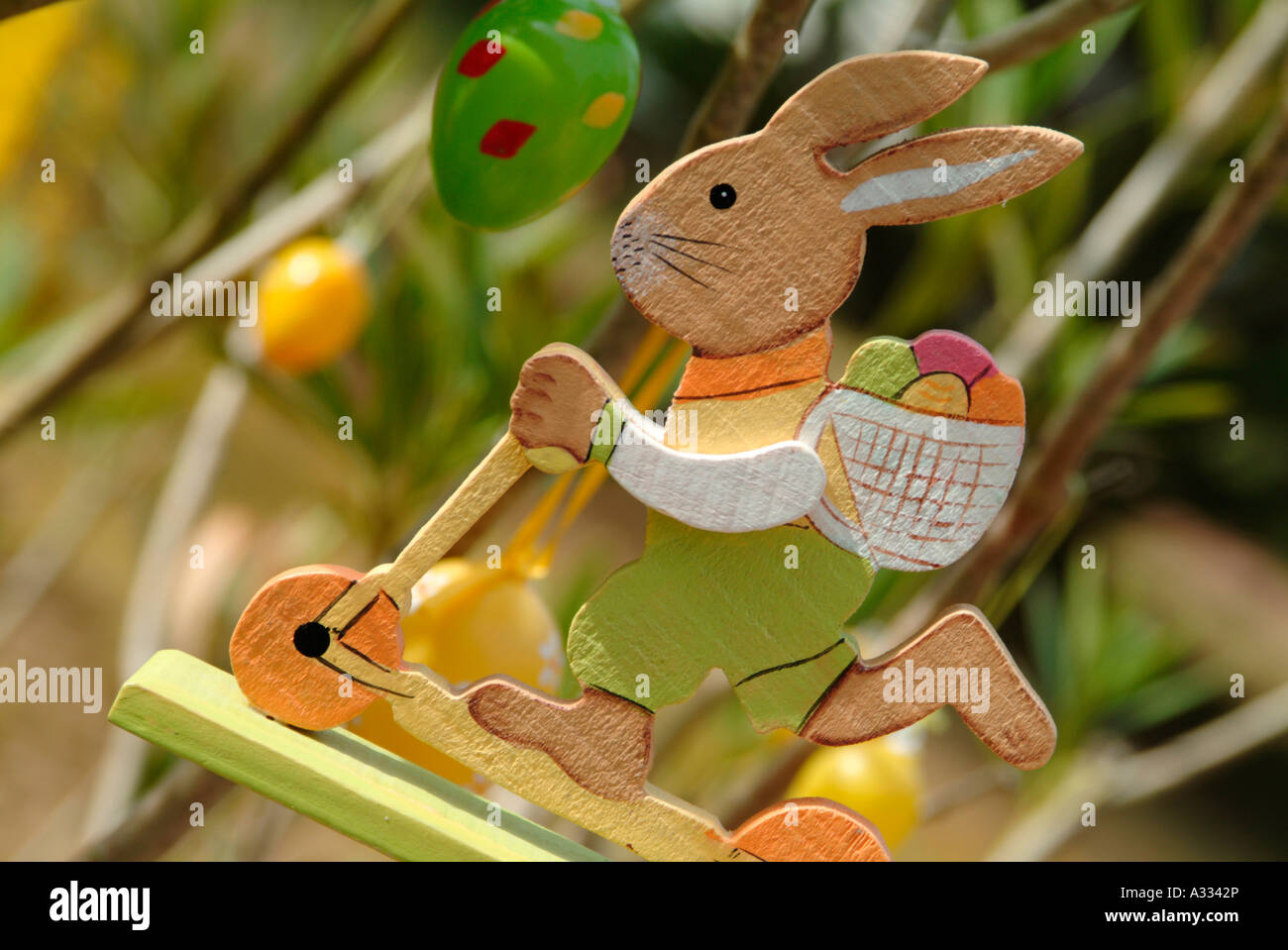 decoration for Easter funny figure of Bunny on spring flowers and ...
