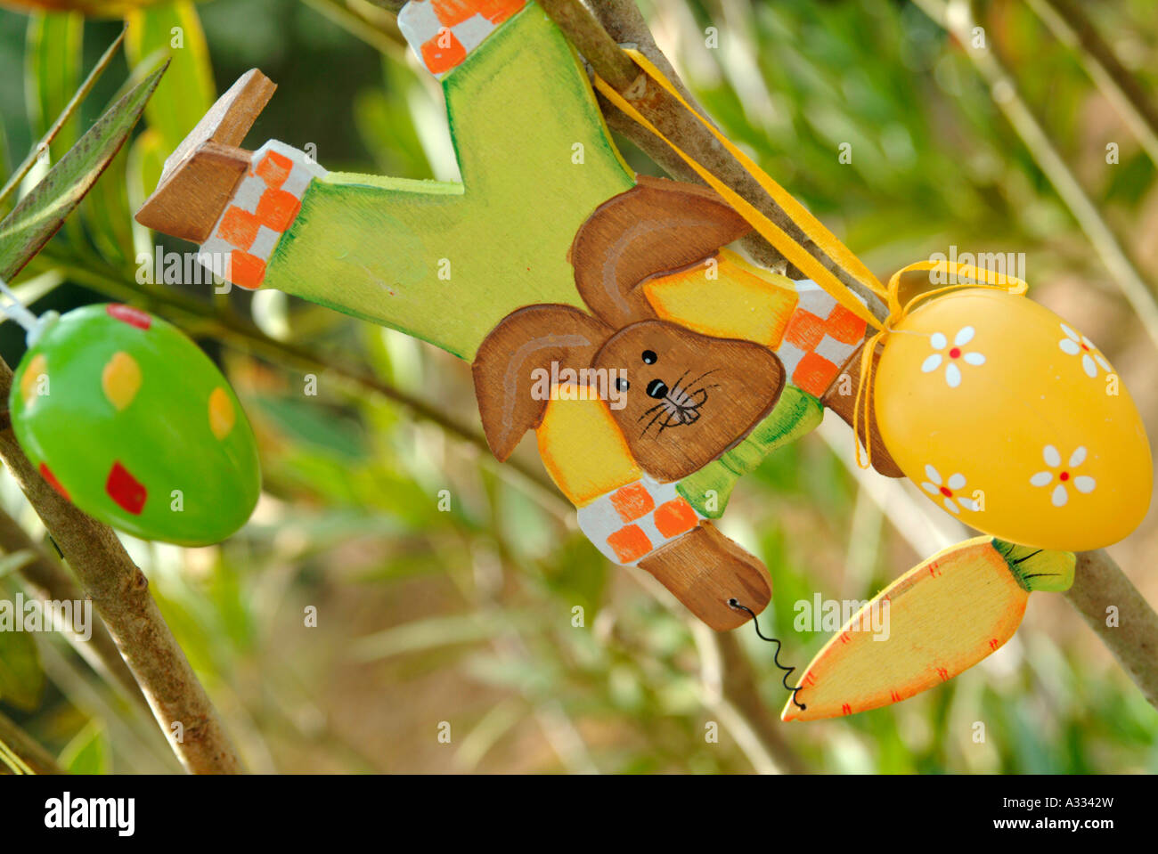 decoration for Easter funny figure of Bunny on spring flowers and ...