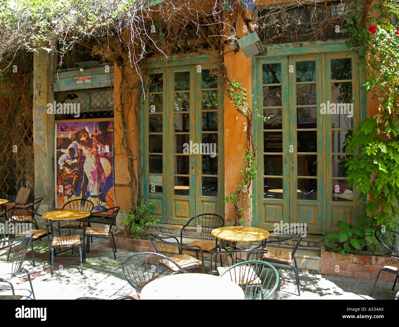 facade storefront of a cafe kafenion in the town Trikala in Greece ...