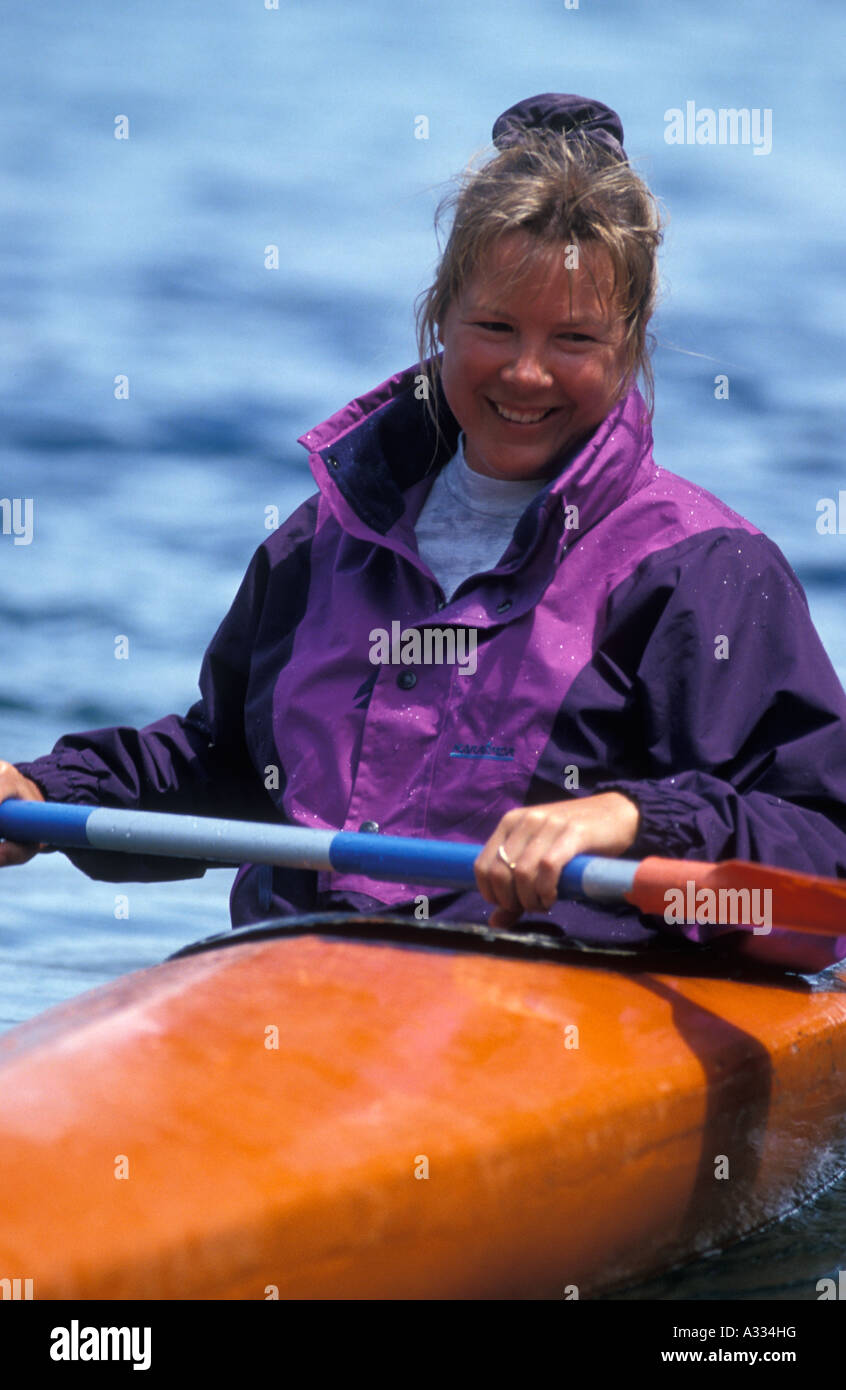 Laughing woman in a canoe Stock Photo - Alamy