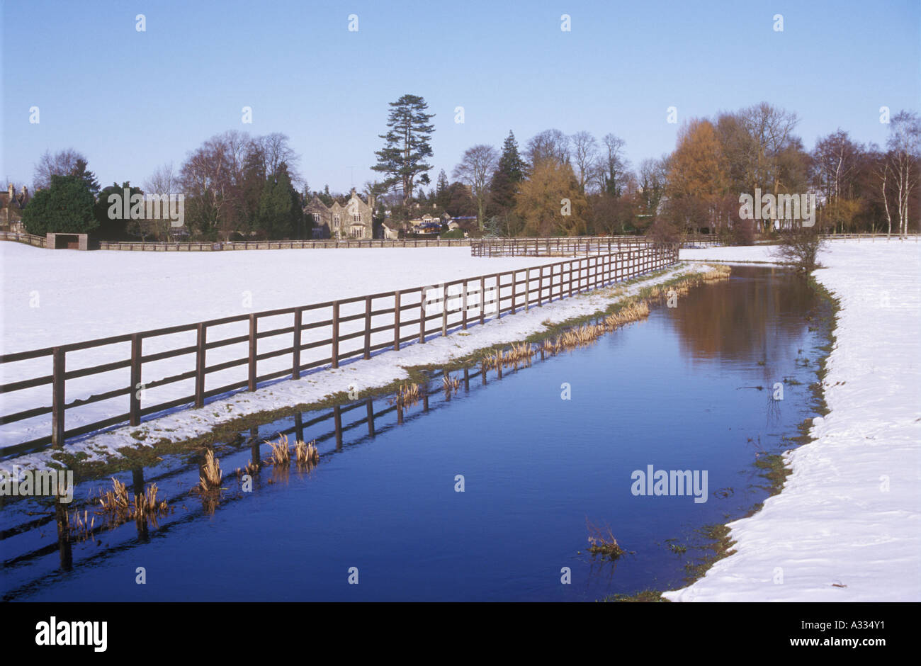 The River Coln at the Cotswold village of Coln Rogers, Gloucestershire ...