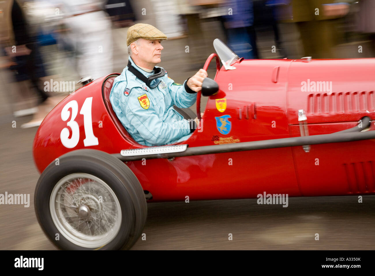 Goodwood Trophy race entrant, the Cisitalia D46, leaves the paddock at ...