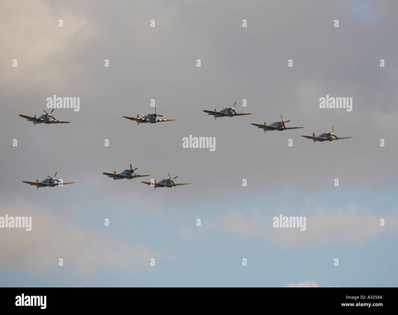 Eight Spitfires flying in formation Duxford airshow 2006 Stock Photo ...