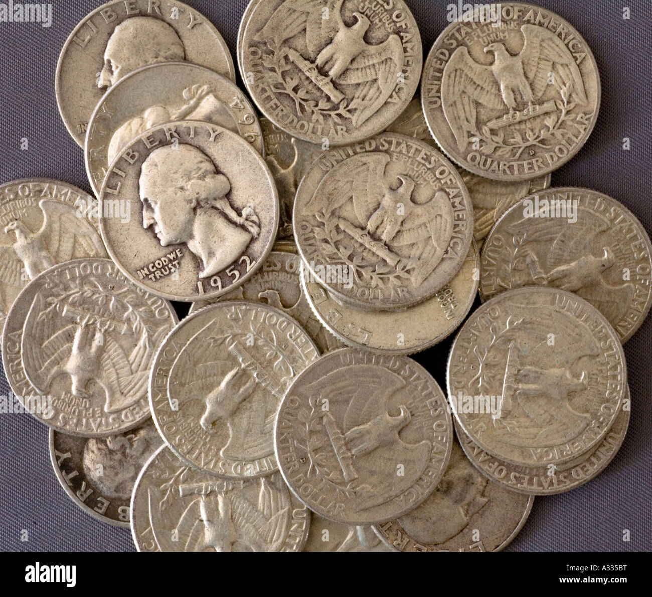 Old, worn, silver quarters Stock Photo - Alamy