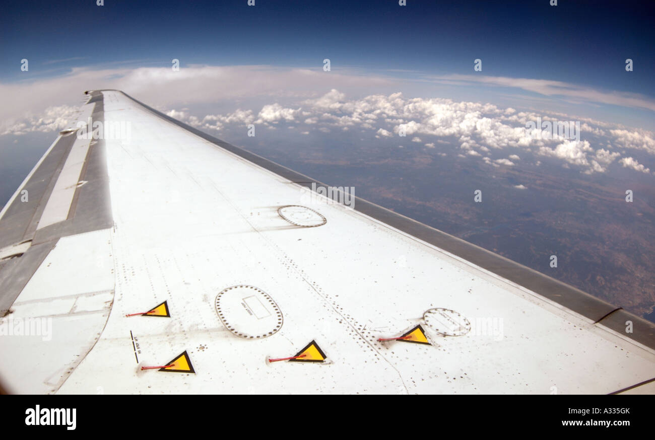 planet earth from an airplane wing Stock Photo - Alamy