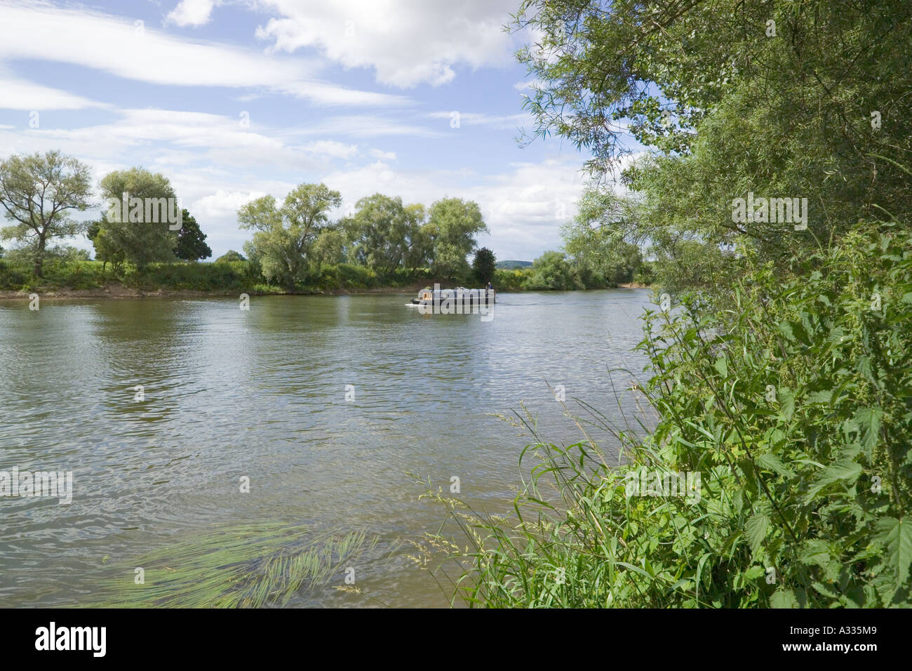 Boating on the River Severn at Deerhurst, Gloucestershire Stock Photo ...
