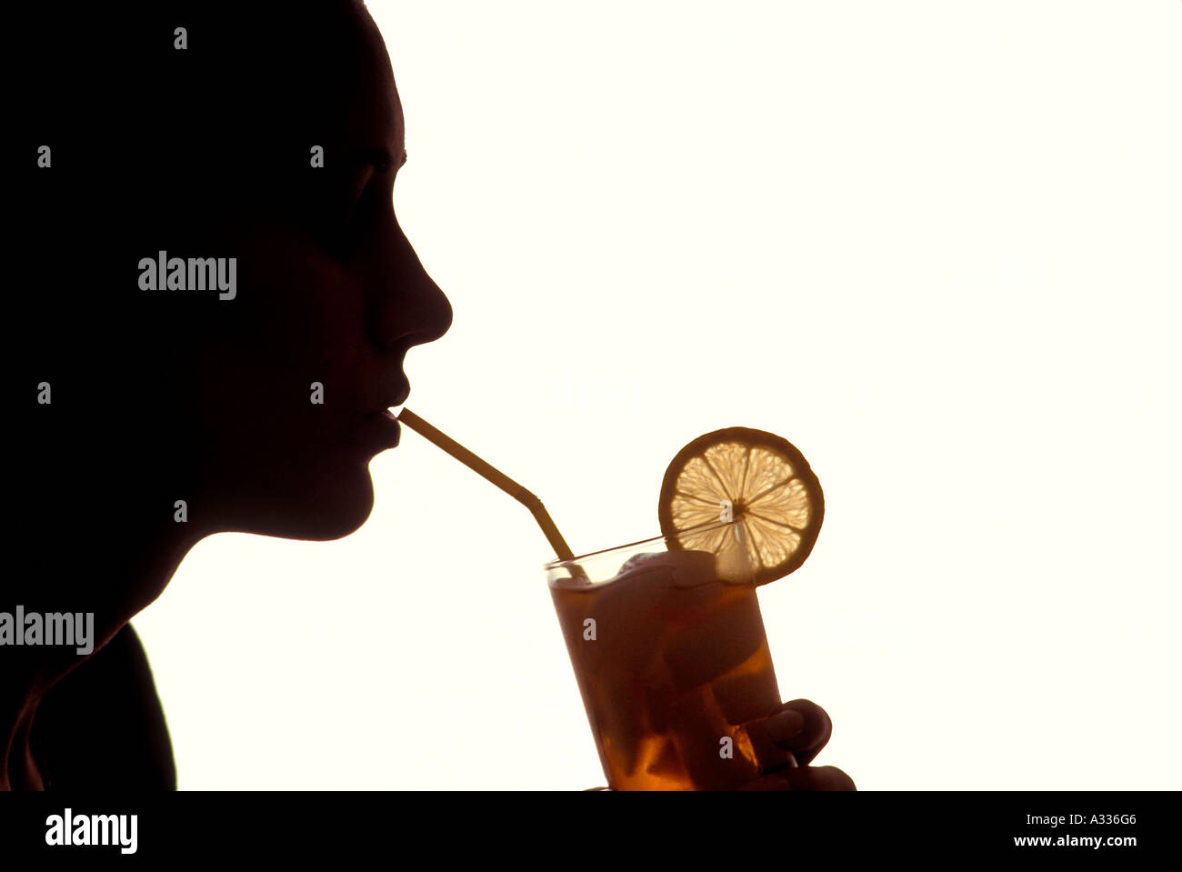 Sipping drinks straw hi-res stock photography and images - Alamy