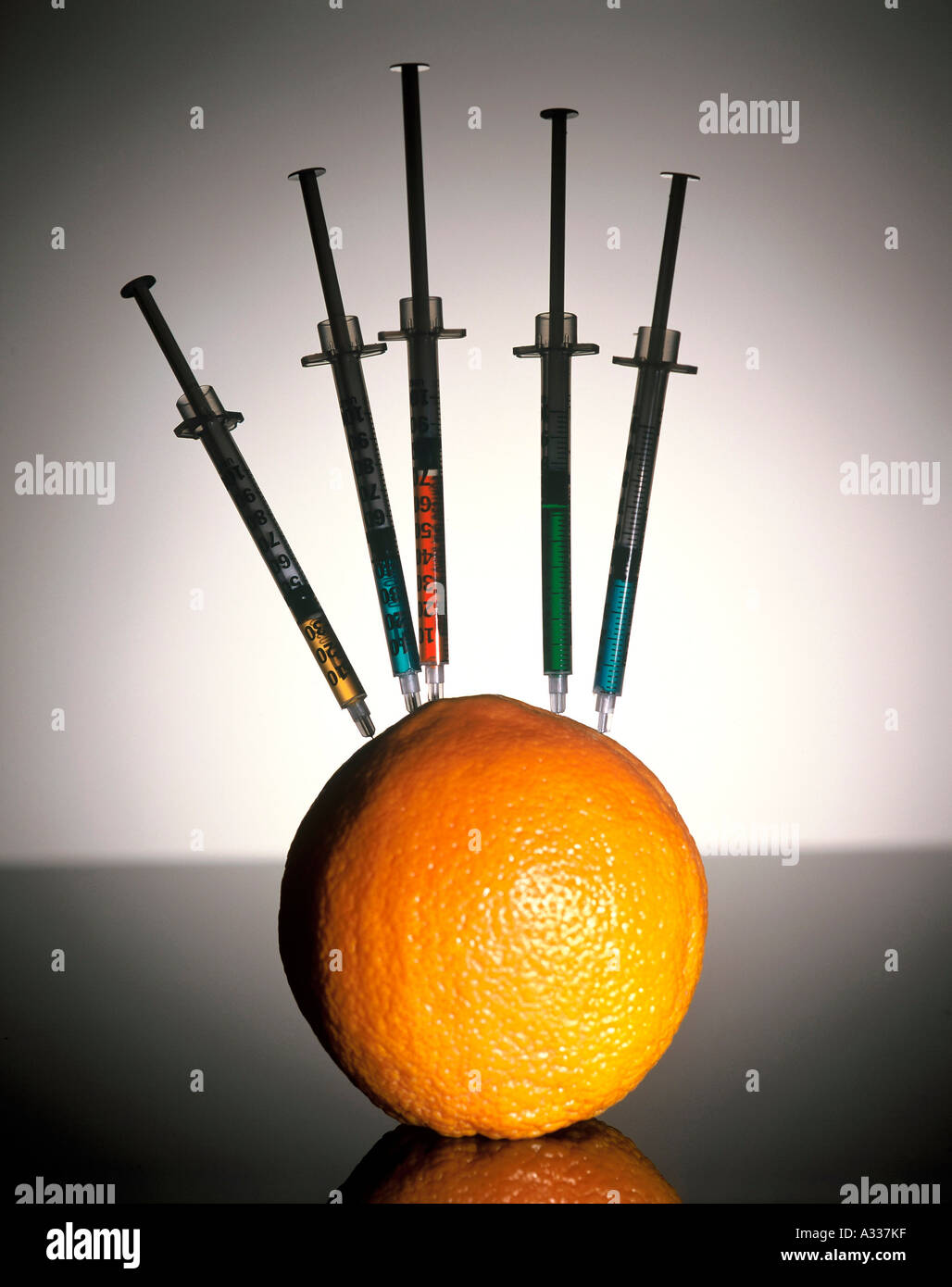 Additives chemicals inside an orange 86E Stock Photo - Alamy