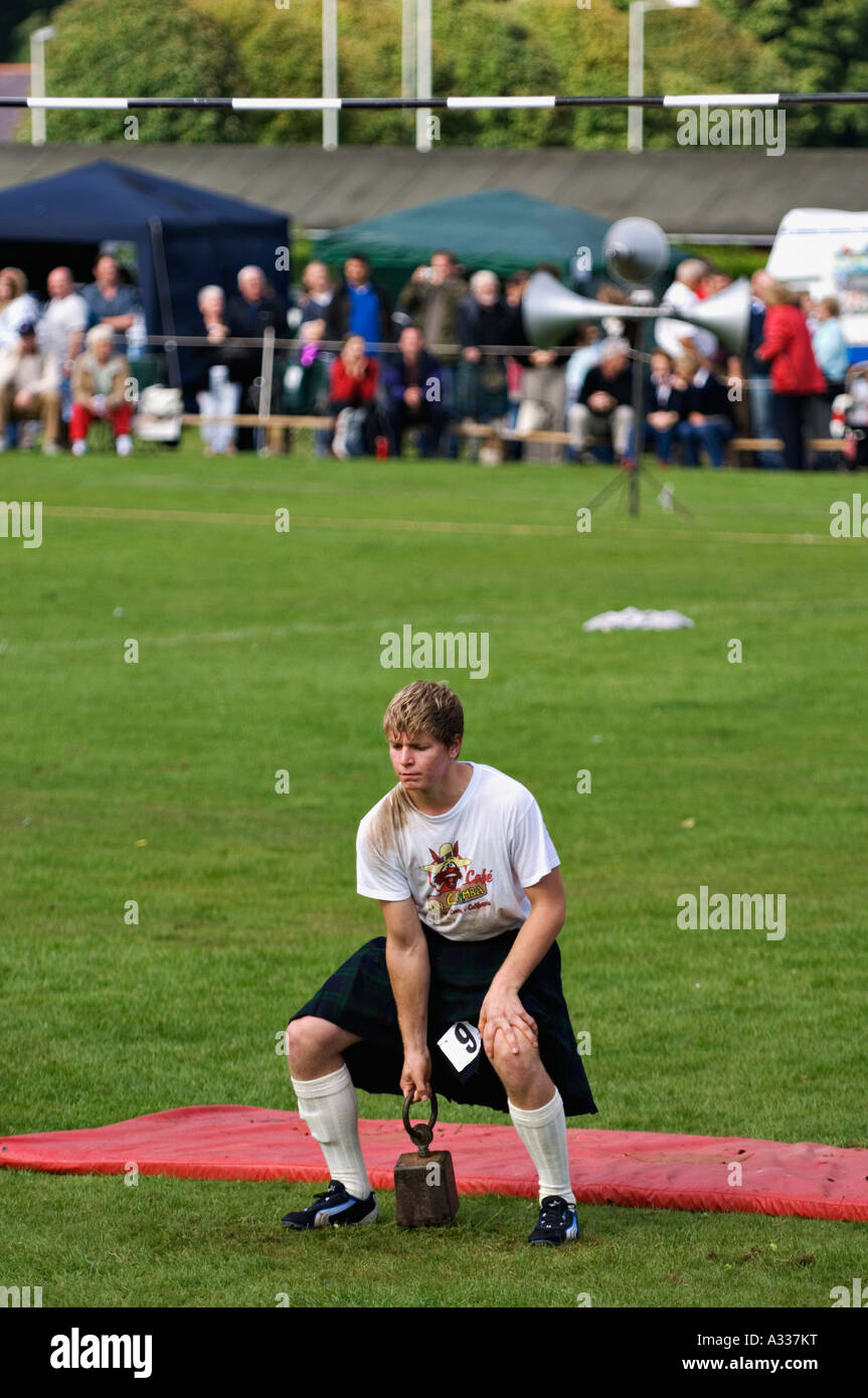 # 1 in a Sequence of a Man Throwing the Weight for Height at ...
