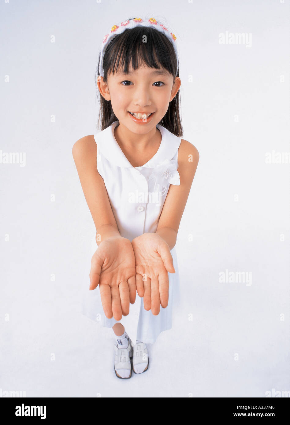 A girl gives her palms Stock Photo - Alamy