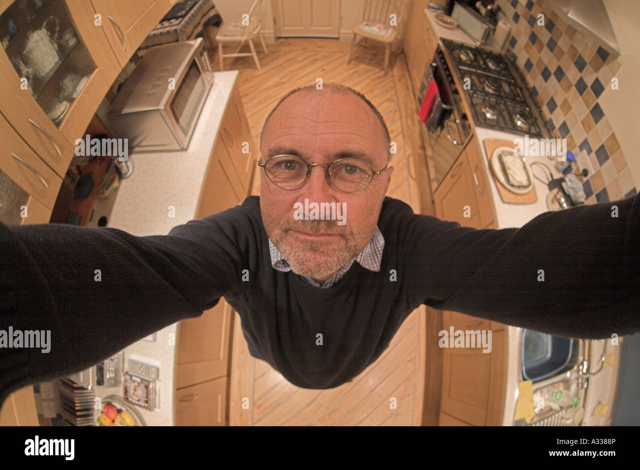 Man looking up at ceiling distorted fish eye fisheye image Stock Photo ...