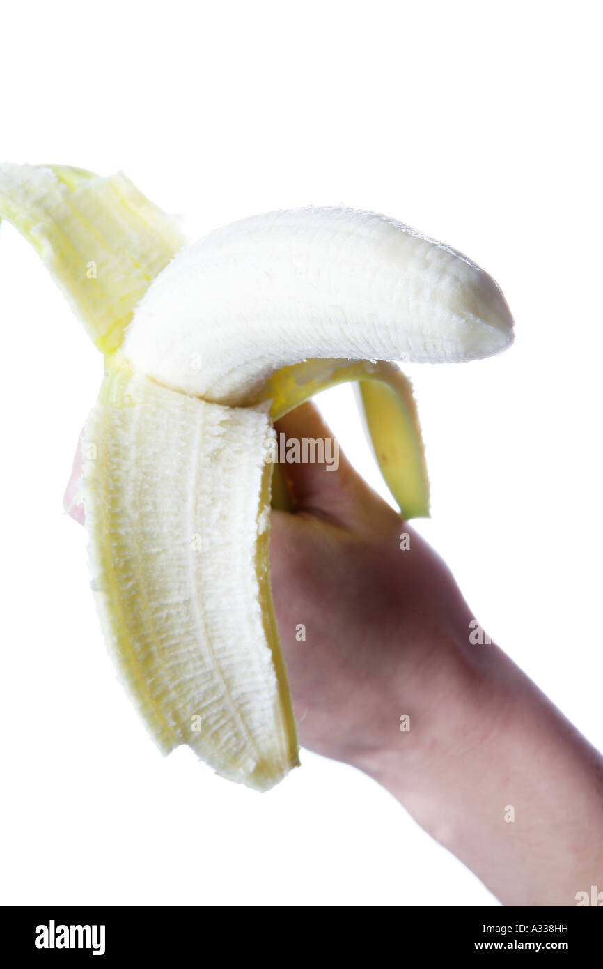 Woman Holding a Banana Model Released Stock Photo - Alamy
