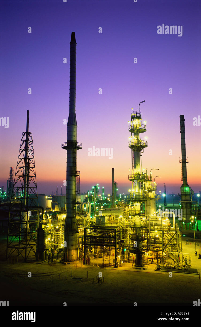 Oil refinery at twilight vertical Stock Photo - Alamy