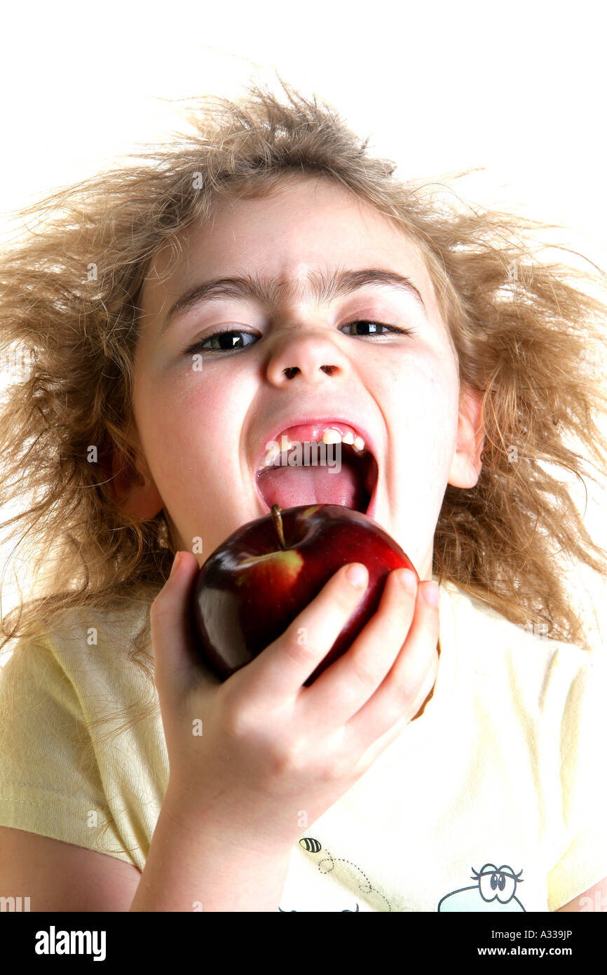 Young Girl Eating an Apple Model Released Stock Photo - Alamy