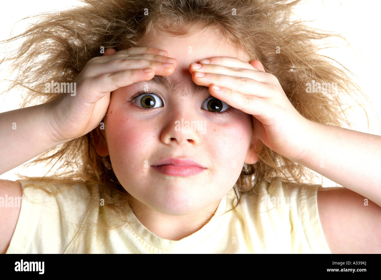 Scared kids covering eyes hi-res stock photography and images - Alamy