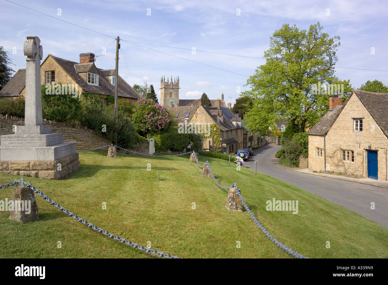 The village green in Cotswold village of Longborough, Gloucestershire ...