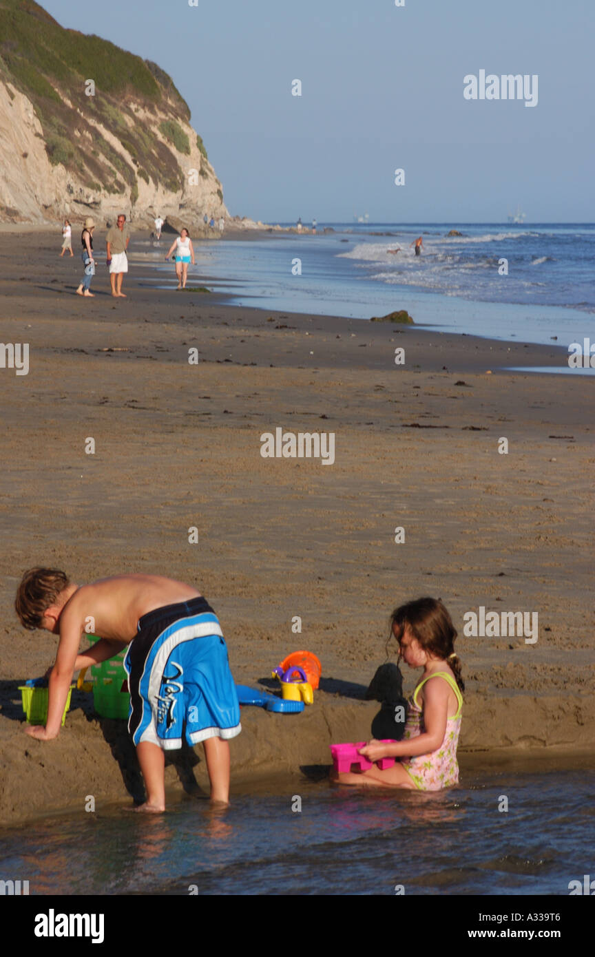 Children Playing on Beach Stock Photo - Alamy