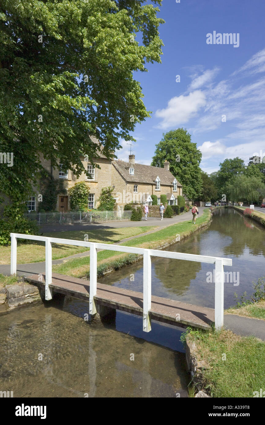 Bridge over the River Eye in the Cotswold village of Lower Slaughter ...