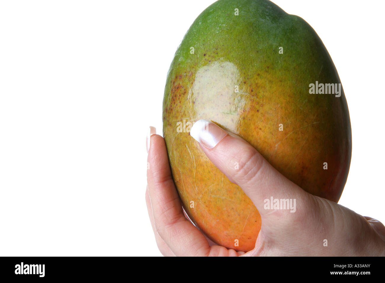 Woman Holding a Mango Model Released Stock Photo - Alamy
