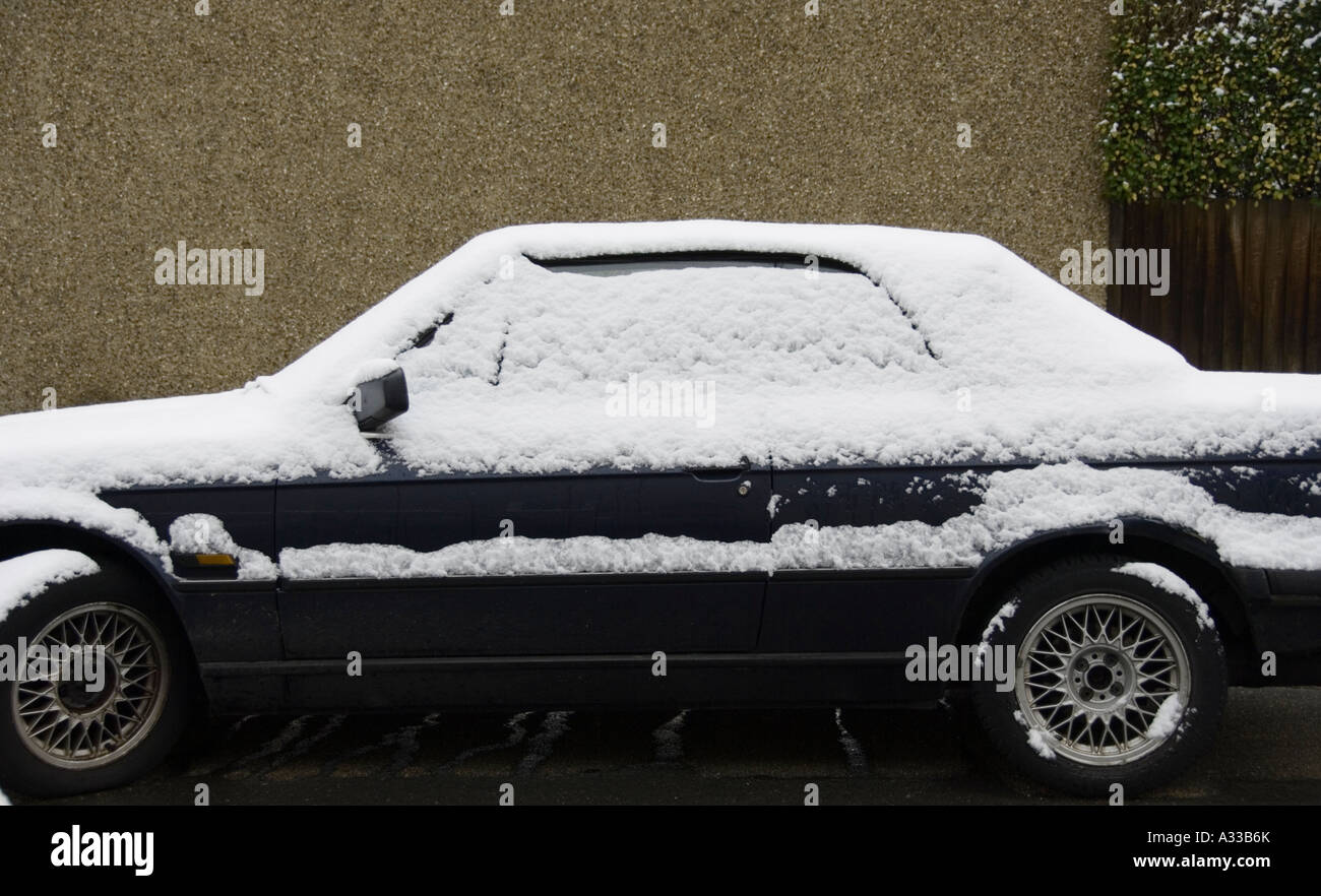 parked soft top car covered in snow Stock Photo - Alamy
