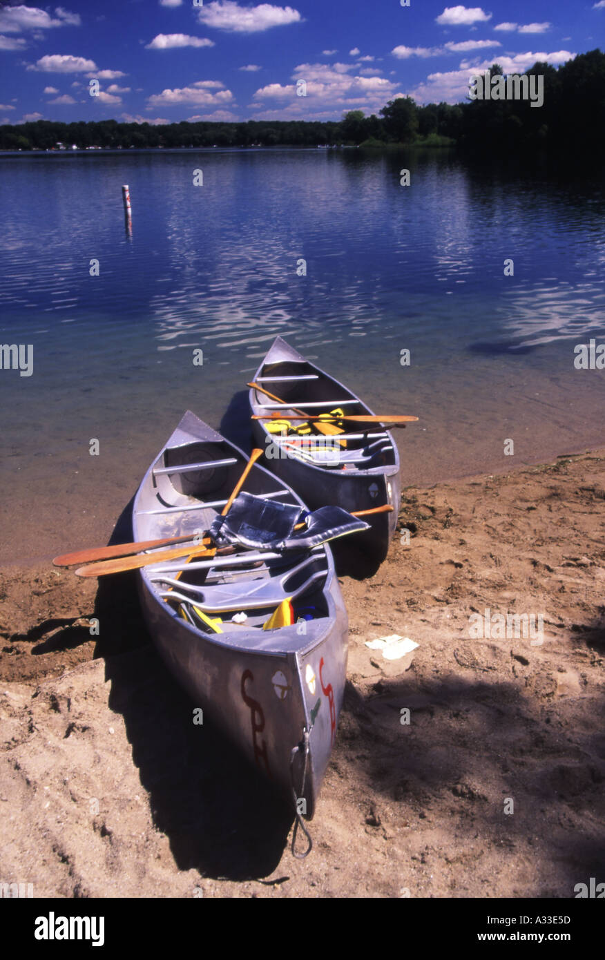 Canoes on the beach Stock Photo - Alamy