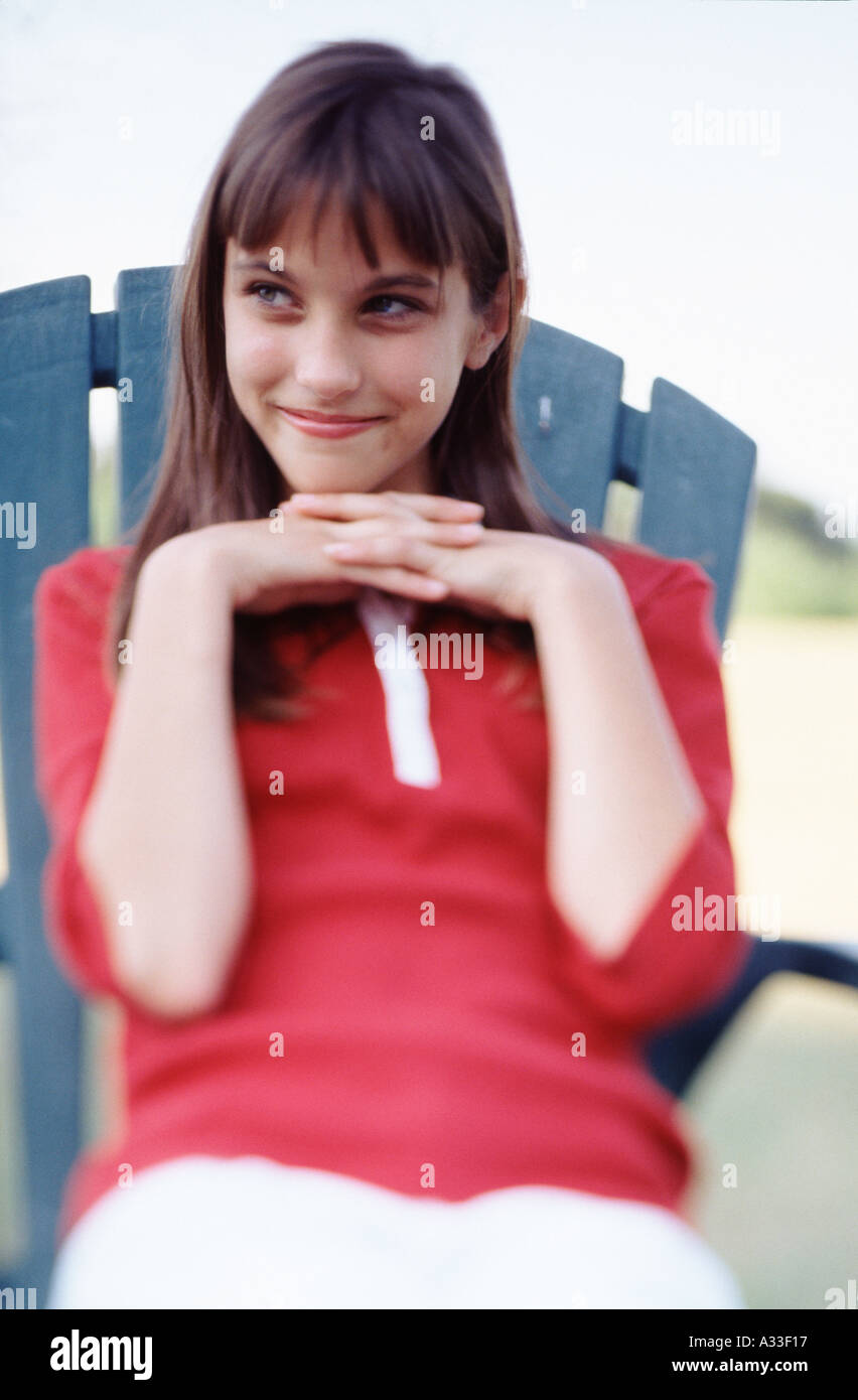 Girl in adirondack chair hi-res stock photography and images - Alamy