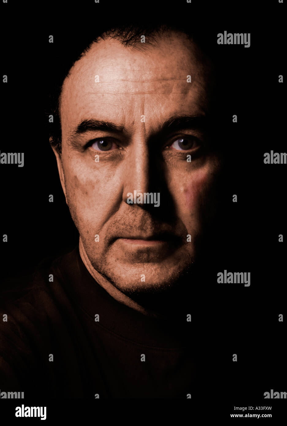 Harsh sepia toned portrait of an aging white man Stock Photo - Alamy