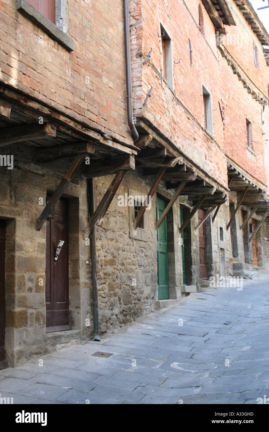 Original medieval eaves and overhanging houses in the Tuscan township ...
