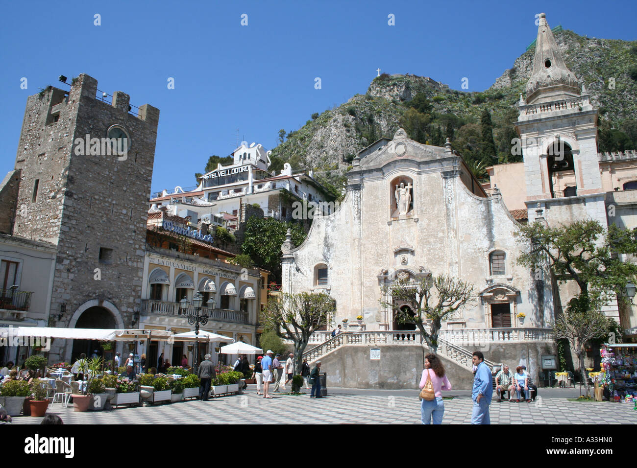 The attractive central square of Taormina on the eastern coast of ...