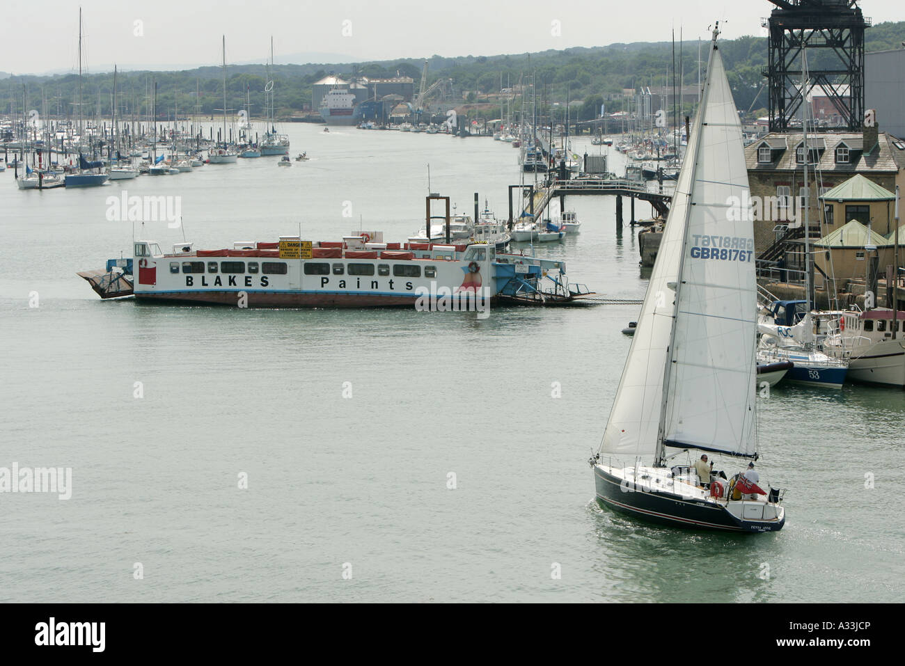 chain ferry takes passengers across cowes harbour on the isle of wight ...